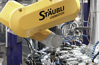 Automation of a rotary indexing machine
