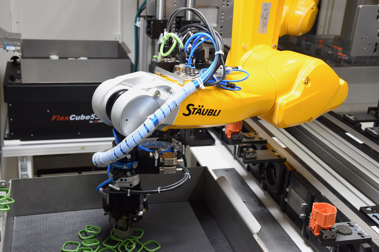 Robot-assisted assembly of high-voltage connectors for electric vehicles