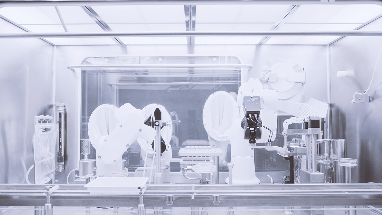 Flexible, automated filling of syringes under aseptic conditions